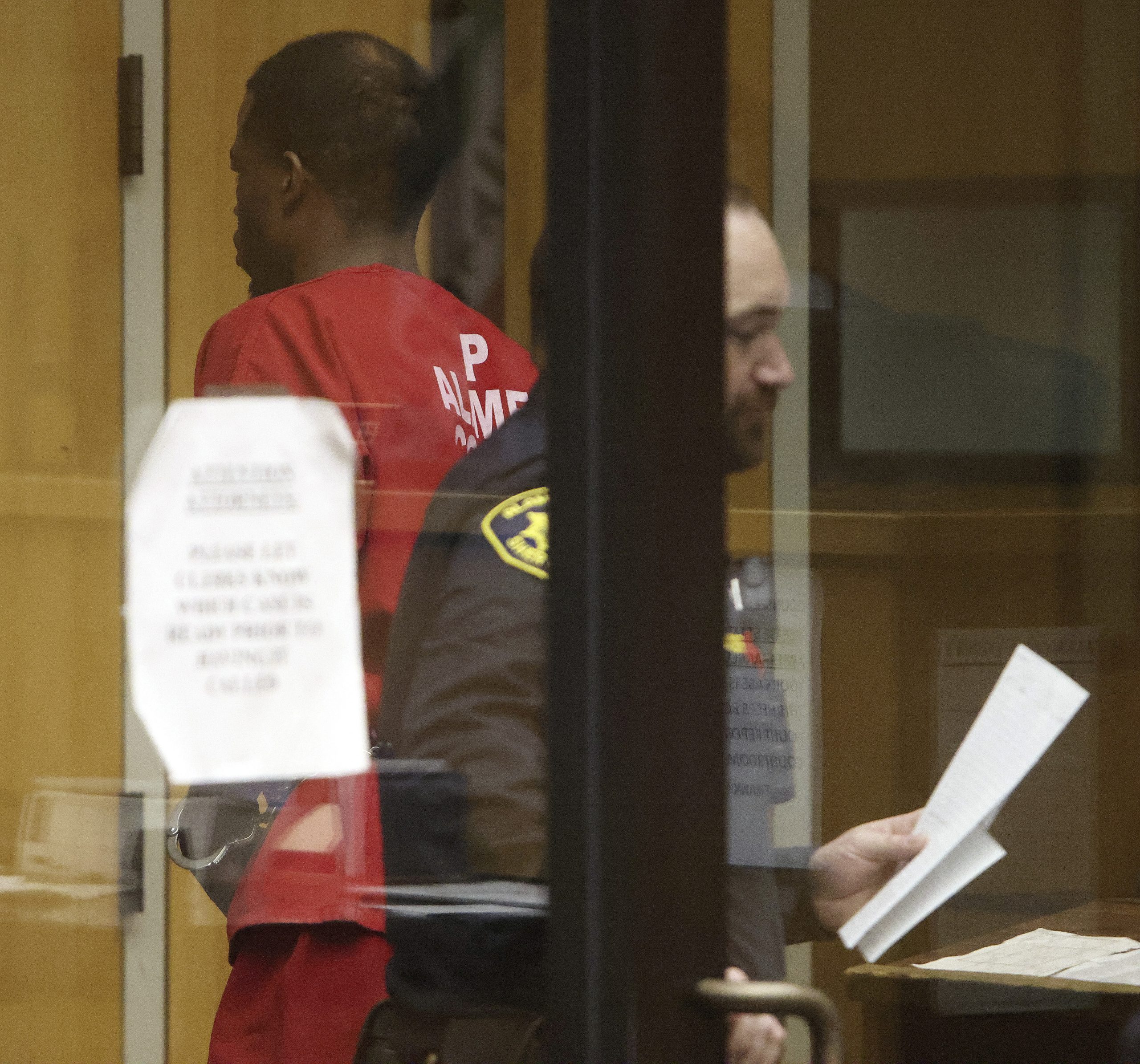 2 men appear in court on murder charges in shooting of Oakland police ...