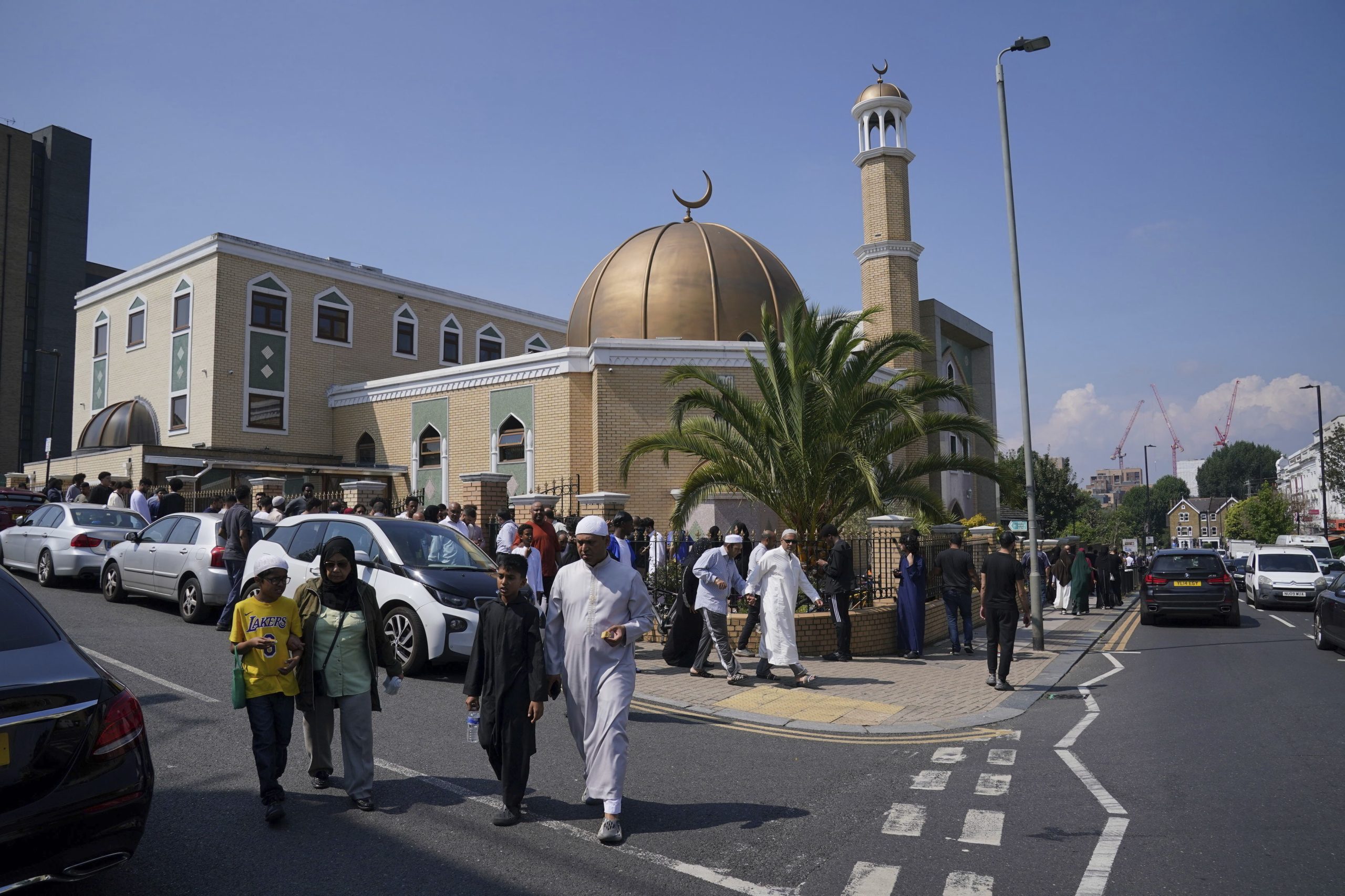 Police officers injured as far-right activists face off against anti ...