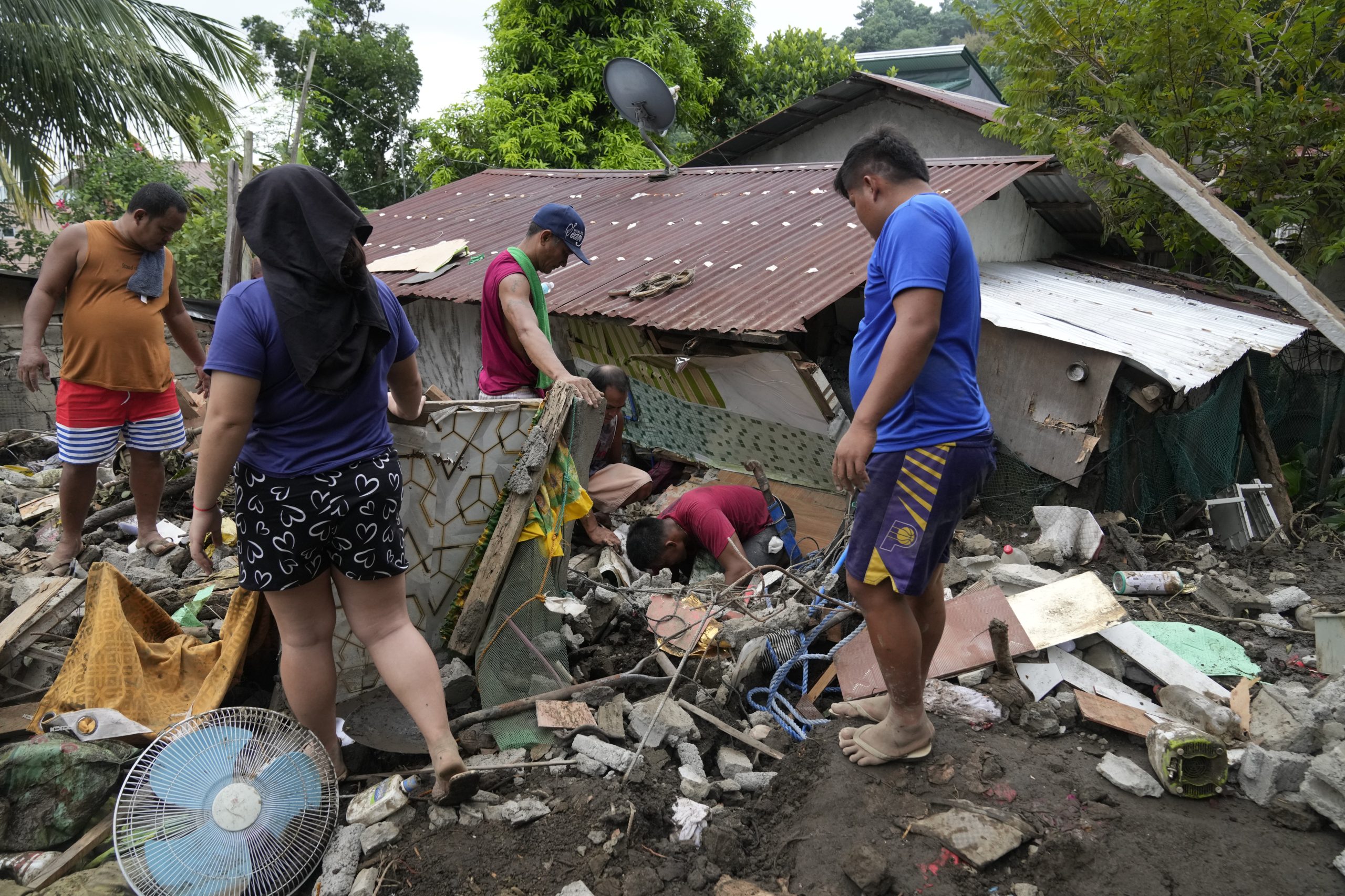 At least 126 dead and missing in massive flooding and landslides in ...