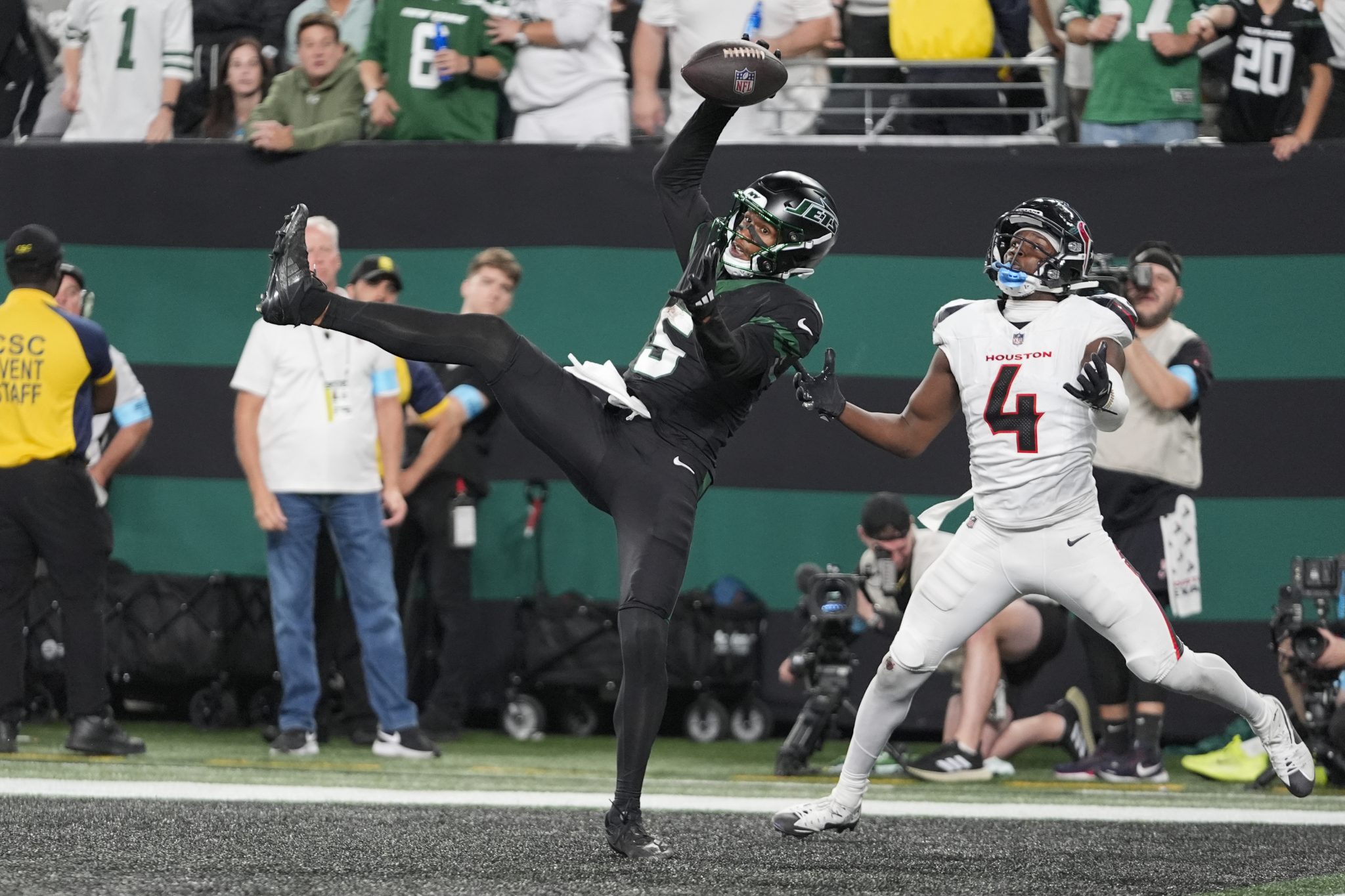 Garrett Wilson makes eye-popping TD catch, Jets beat Texans 21-13 to ...