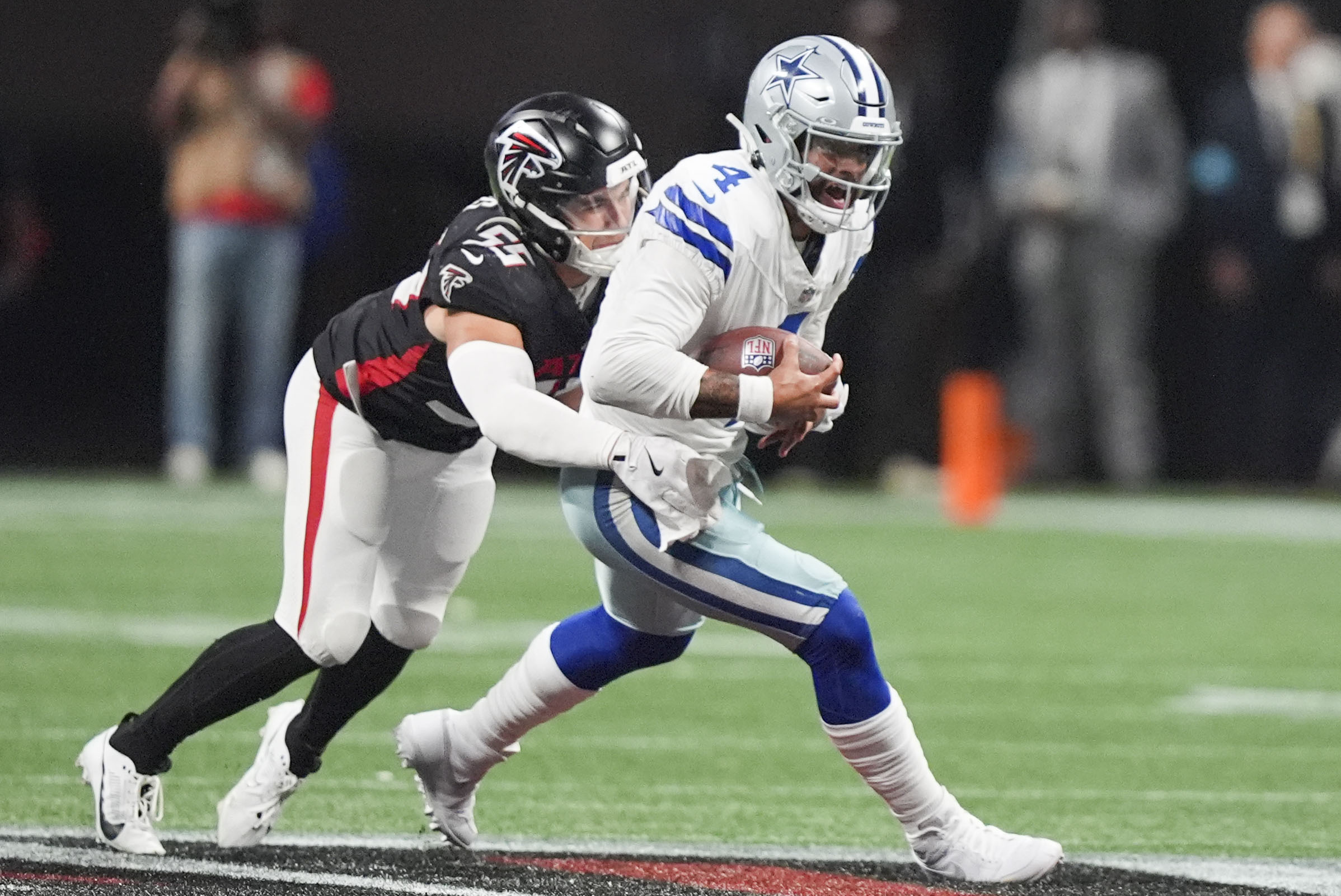 Cowboys QB Dak Prescott is knocked out of game at Atlanta with ...
