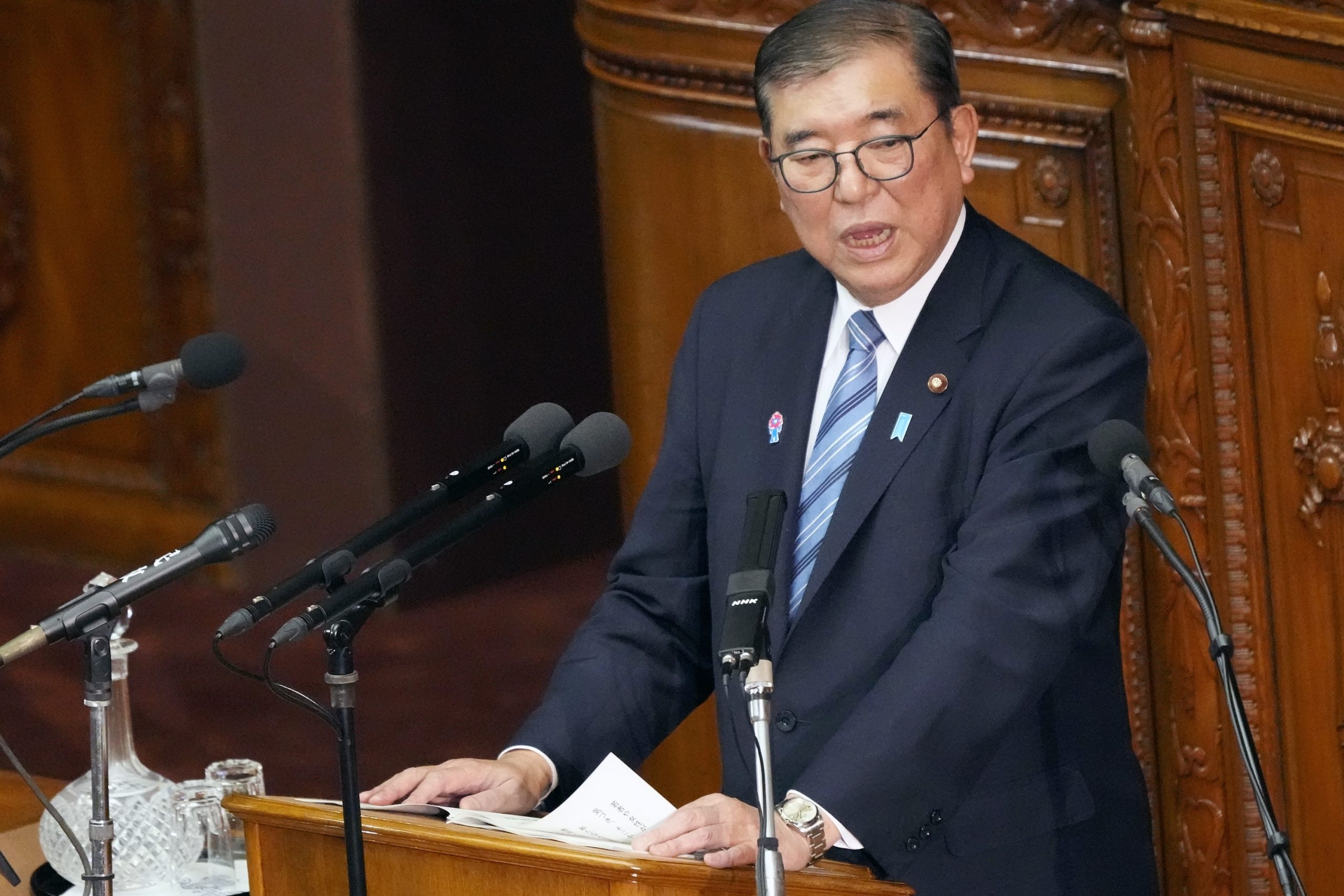 Japan's leader says he's preparing for tough negotiations with Trump on ...