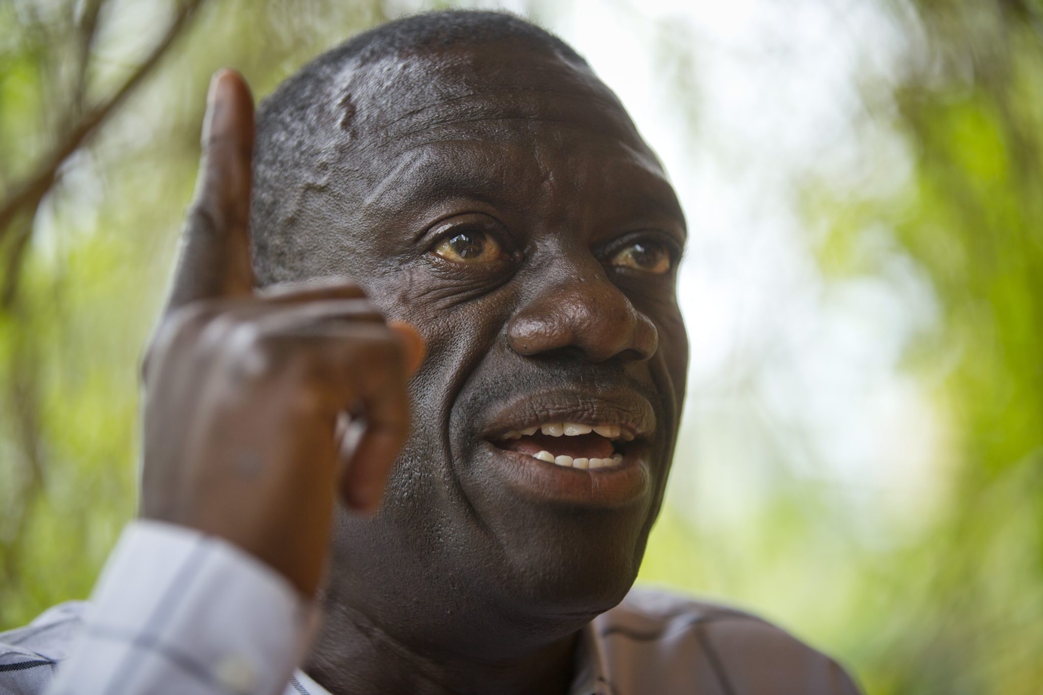Ugandan opposition figure Besigye, looking frail, appears in court as ...