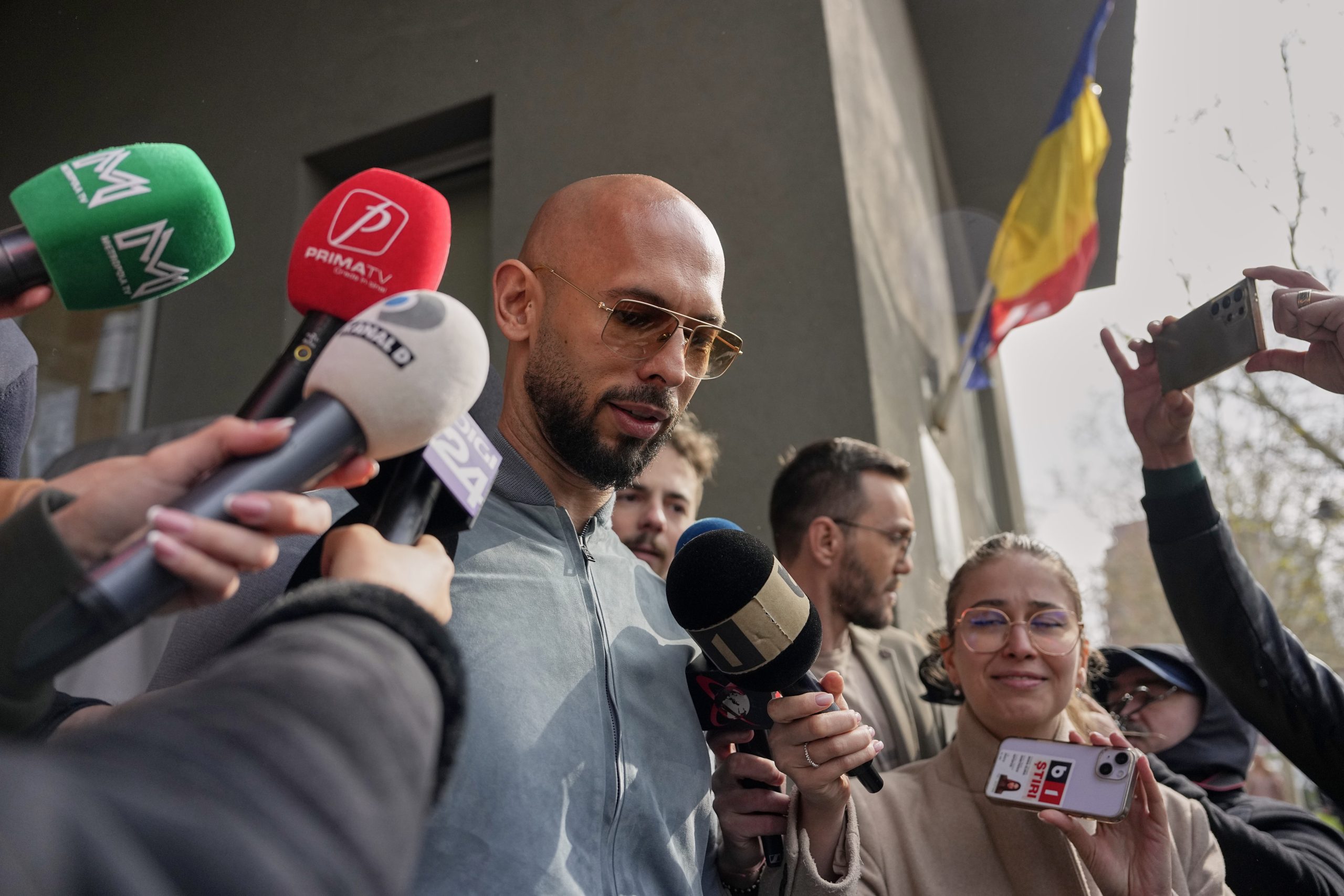 Influencer Andrew Tate accused of pointing gun at woman's face ahead of ...