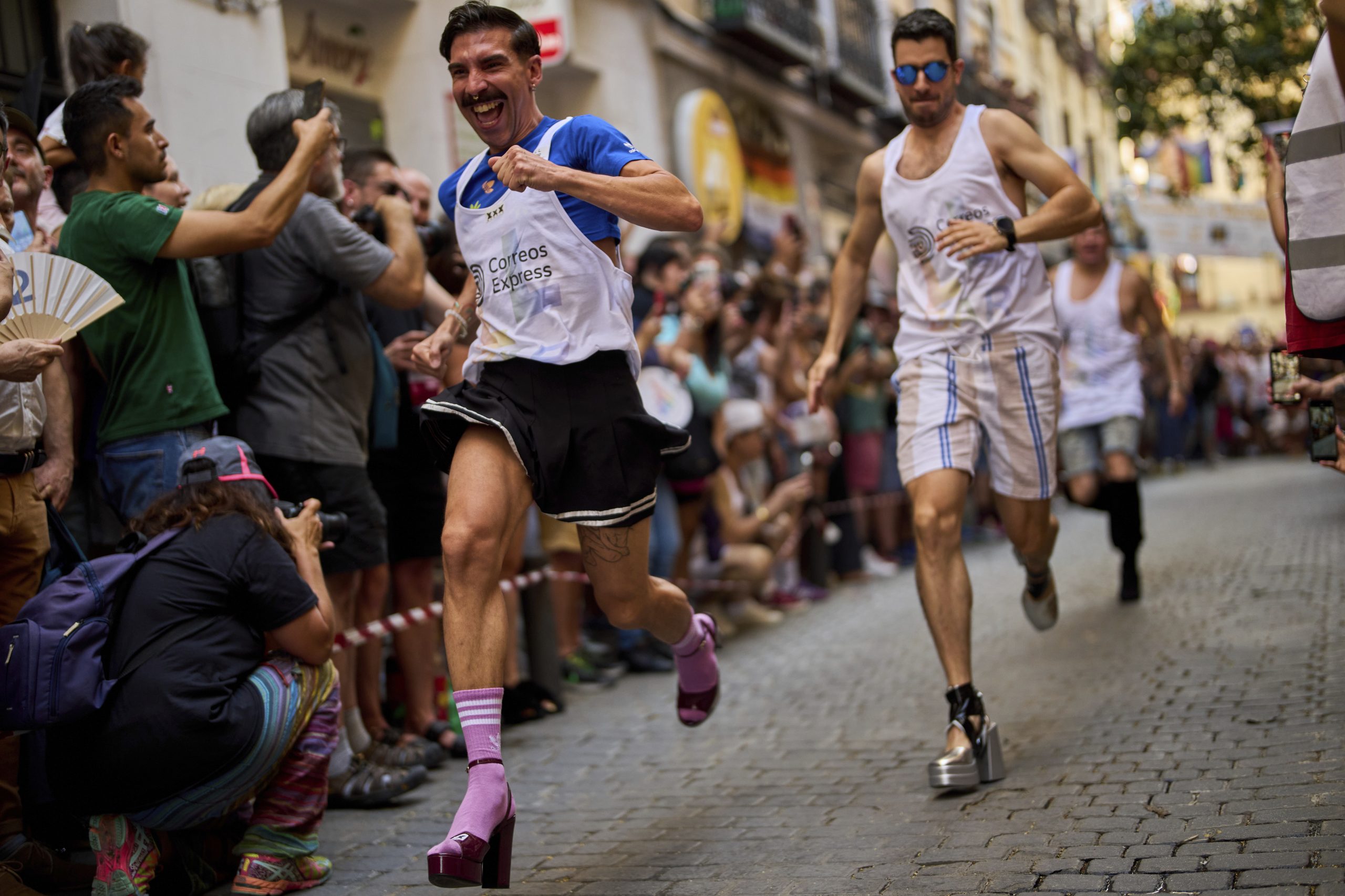 Photos of Madrid's high heel race where runners braved the heat for ...