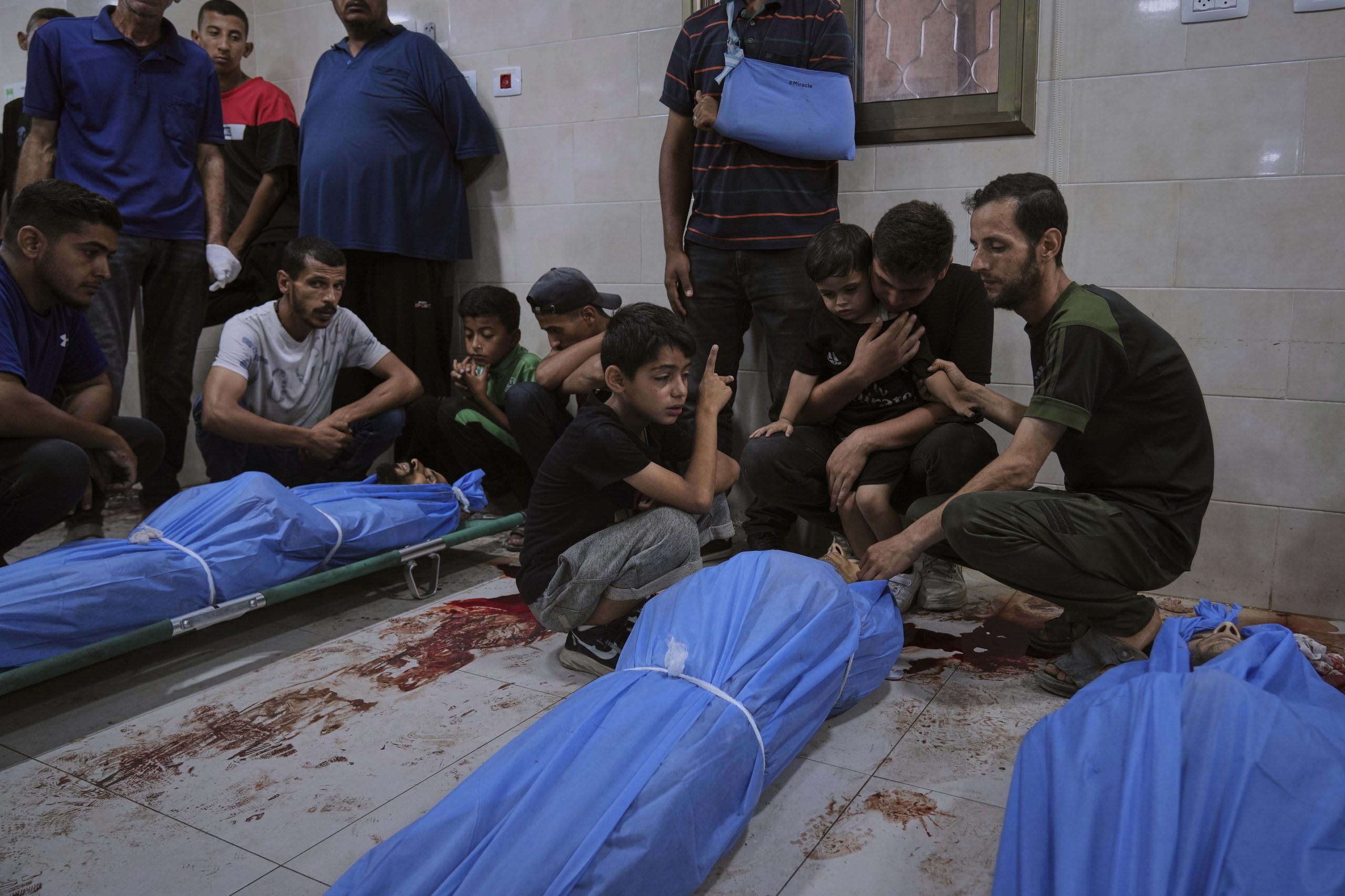 Photos show Palestinians mourning after people were killed in Israeli ...