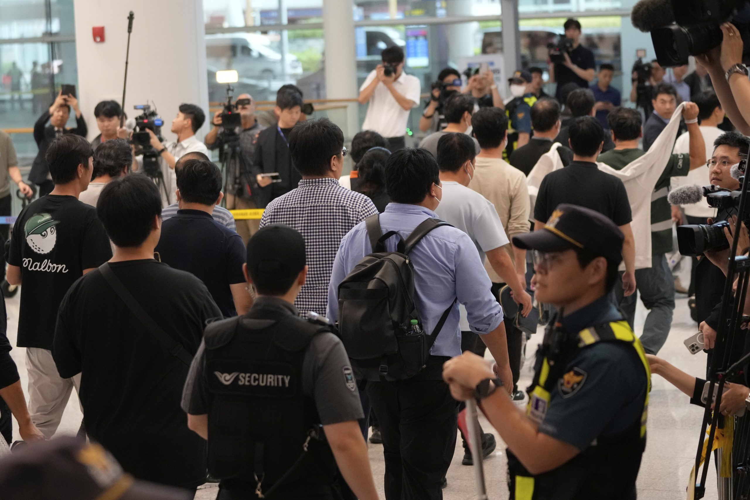 South Korean workers released after days of detention in Georgia return ...