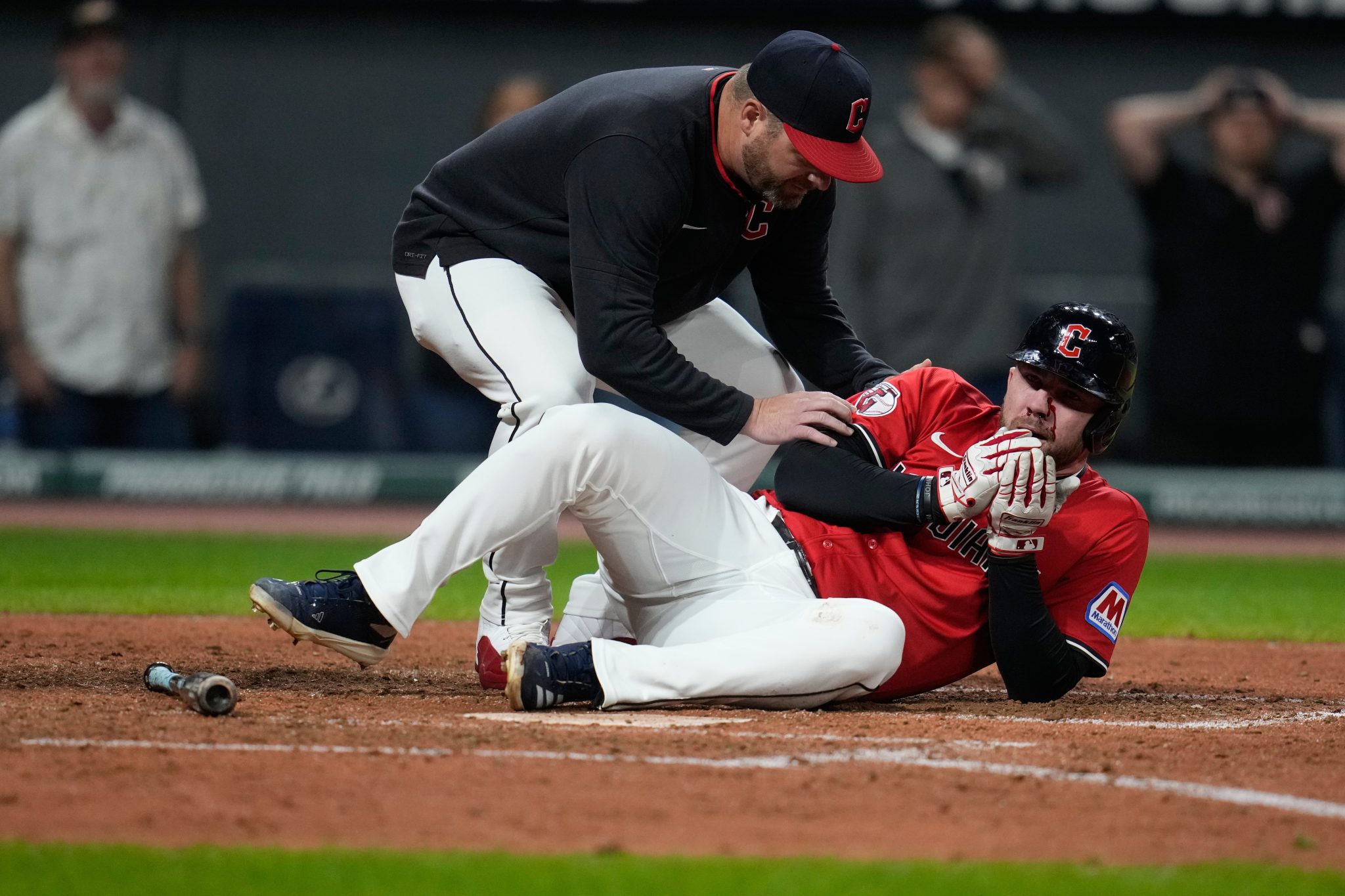 Guardians' David Fry carted off field after being hit in face by pitch ...