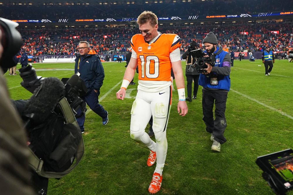 Bo Nix breaks his right ankle late in Broncos' playoff win, will have ...